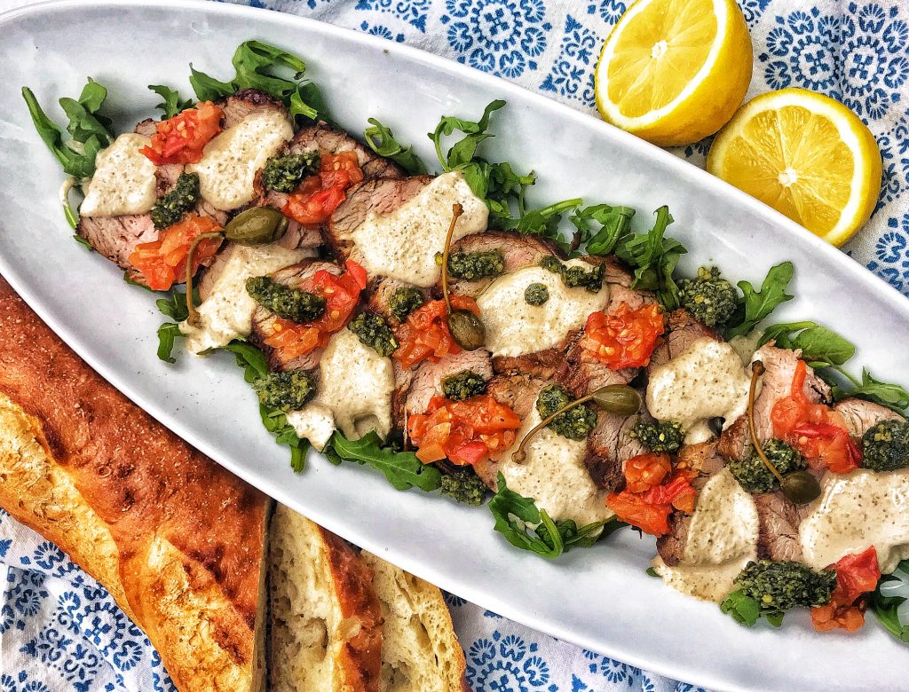 Vitello Tonnato with a twist: Veal, tuna sauce, pesto and tomato concassé